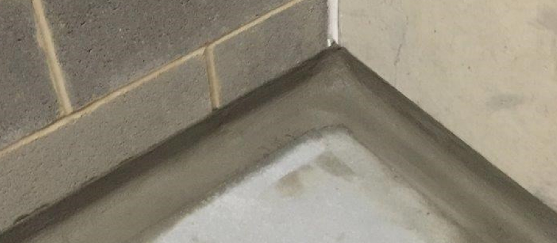 Lift shaft waterproofing, concrete repairs and coving and flooring ...